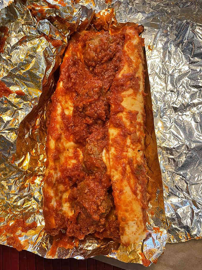 The Pizza Burger brings two beloved foods together in holy matrimony, and yes, you may now kiss the bride.