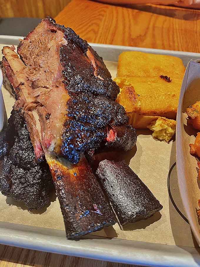 Beef ribs this size require both hands, zero shame, and possibly a forklift for your food coma later.