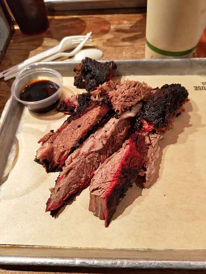 The beautiful bark on that brisket tells you everything about the hours of patient smoking that created this masterpiece.