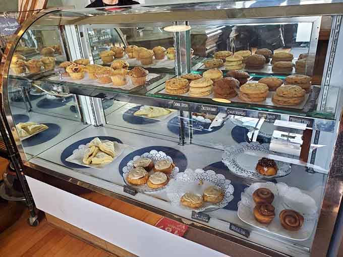 That pastry case holds more temptation than a dessert cart at a fancy restaurant, minus the pretension.