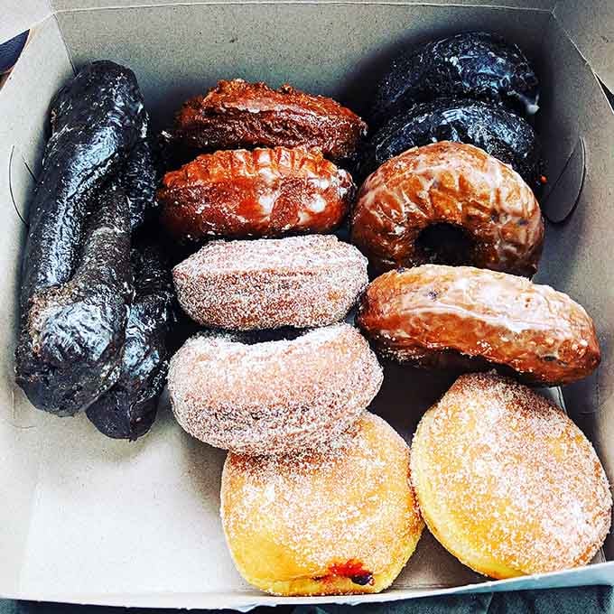 This box of assorted donuts is basically a choose-your-own-adventure story, except every ending involves happiness and possibly needing new pants.