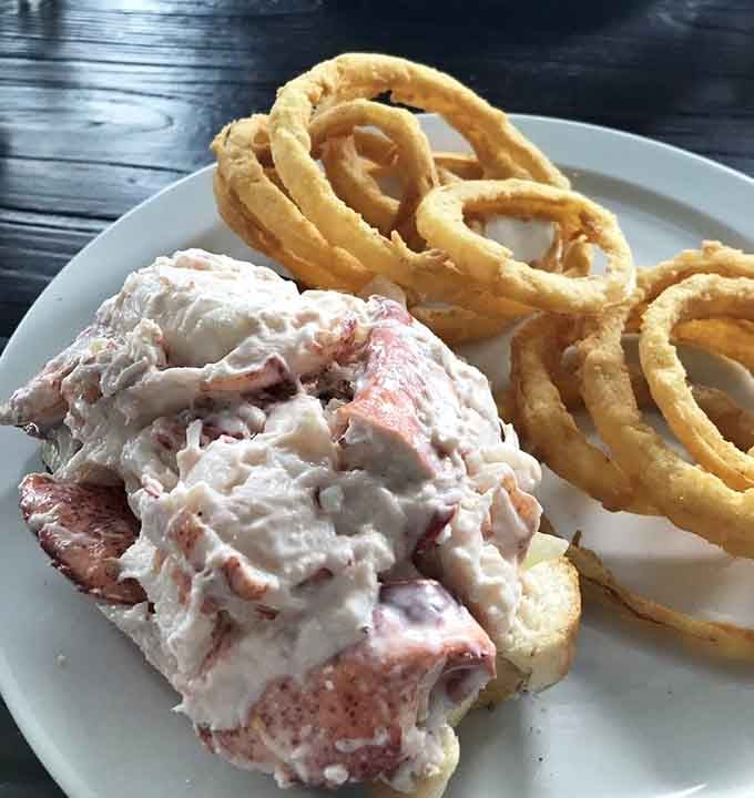 That lobster roll overflow is no accident, just generous portions of sweet meat that make every bite worth the splurge.