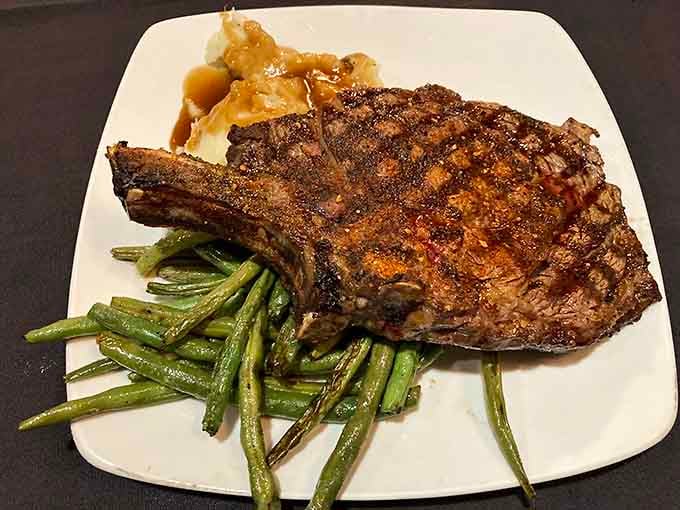 This perfectly seasoned steak with green beans and mashed potatoes proves tavern food can be downright elegant.