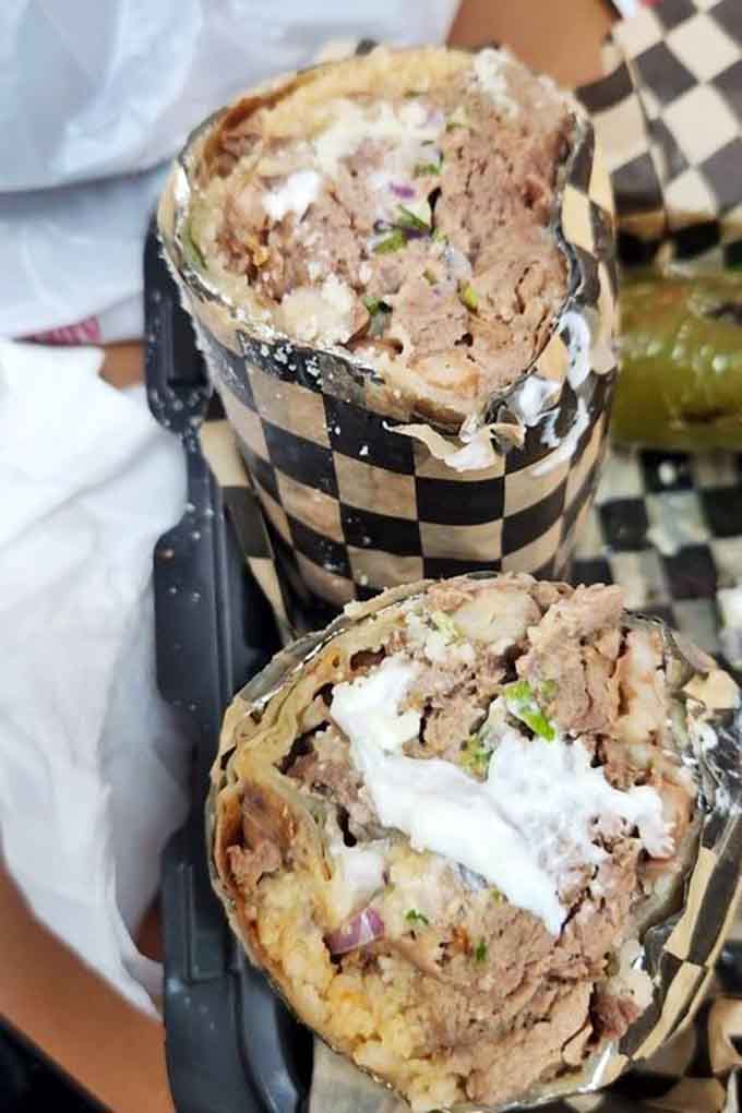 These birria burritos are wrapped tight and packed with enough flavor to justify the inevitable food coma afterward.