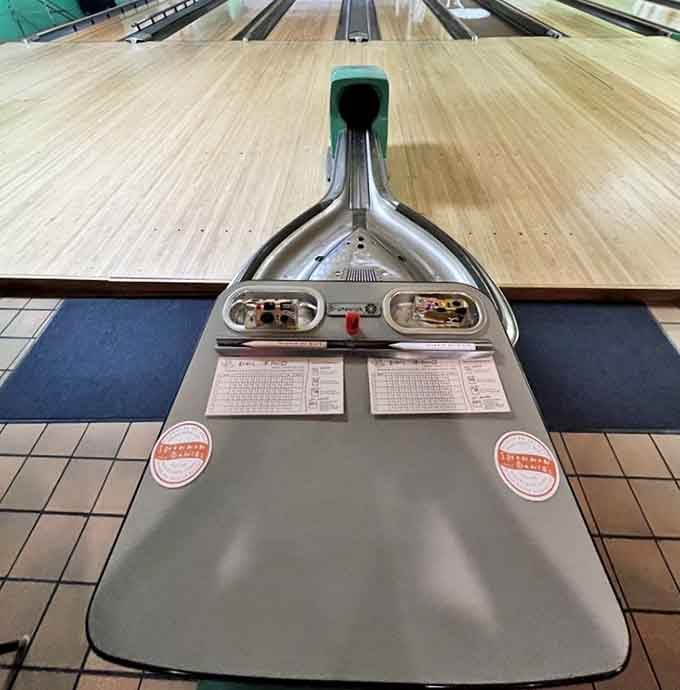 The classic ball return system, a mechanical marvel that's been faithfully delivering bowling balls for generations of players.