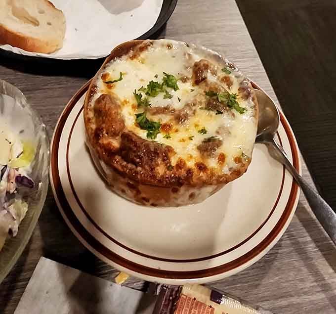 French onion soup bubbling with melted cheese, the kind of comfort food that makes winter almost bearable.
