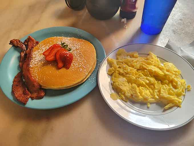 Classic pancakes, crispy bacon, and fluffy scrambled eggs prove that sometimes the simple things are simply the best things.