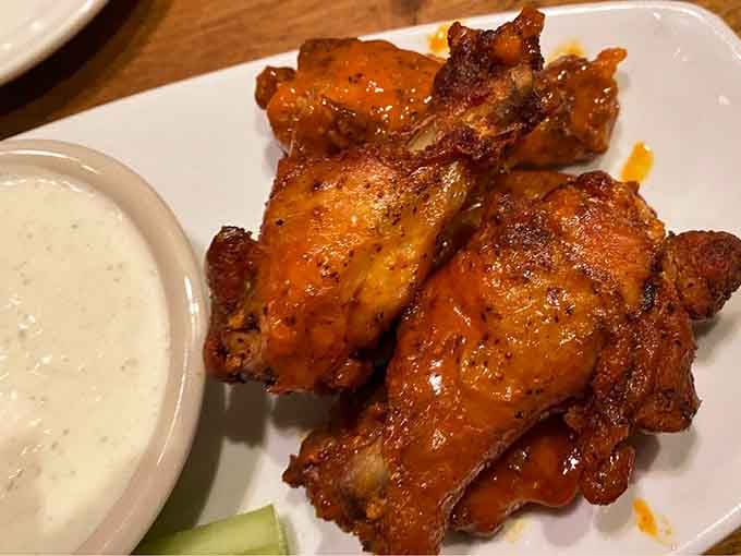 Wings glazed to perfection, sticky fingers guaranteed, napkins optional but highly recommended for polite company and first dates.