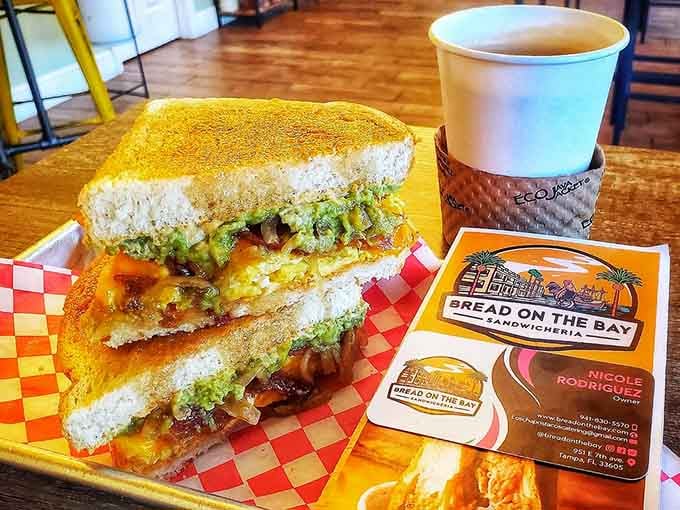 That avocado breakfast sandwich on Cuban toast is basically morning sunshine wrapped in carbs and held together by genius.