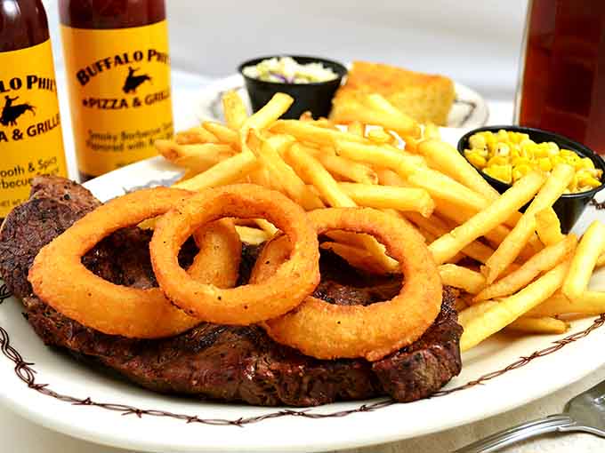 Crispy onion rings crowning a juicy steak is the kind of excess that makes dining out truly worthwhile.