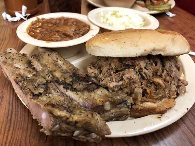 Ribs and pulled pork sharing one plate is like watching your two favorite actors team up perfectly.