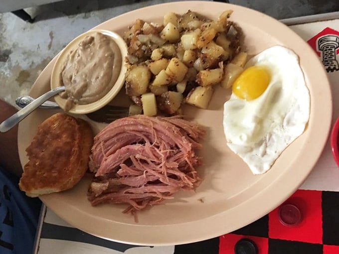 That pile of country ham with perfectly seasoned home fries and a fried egg is what breakfast dreams are made of.