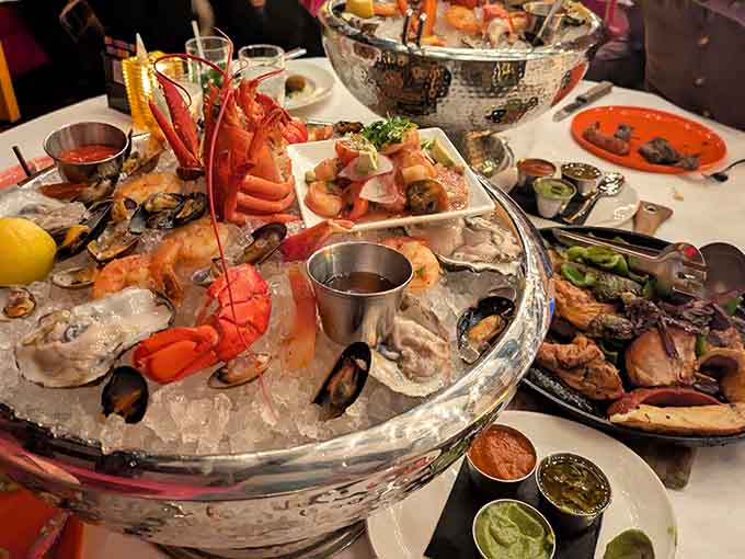 This seafood tower is basically the Sistine Chapel of shellfish, a masterpiece that deserves its own museum exhibit and standing ovation.