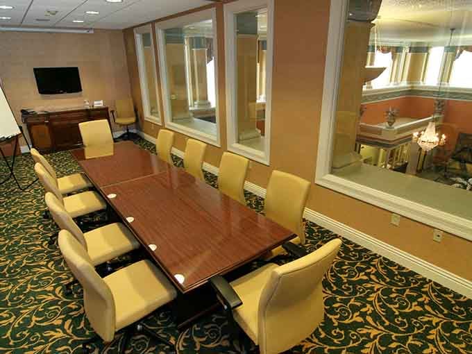 Conference rooms this elegant make even quarterly budget meetings feel like scenes from a prestige drama series.