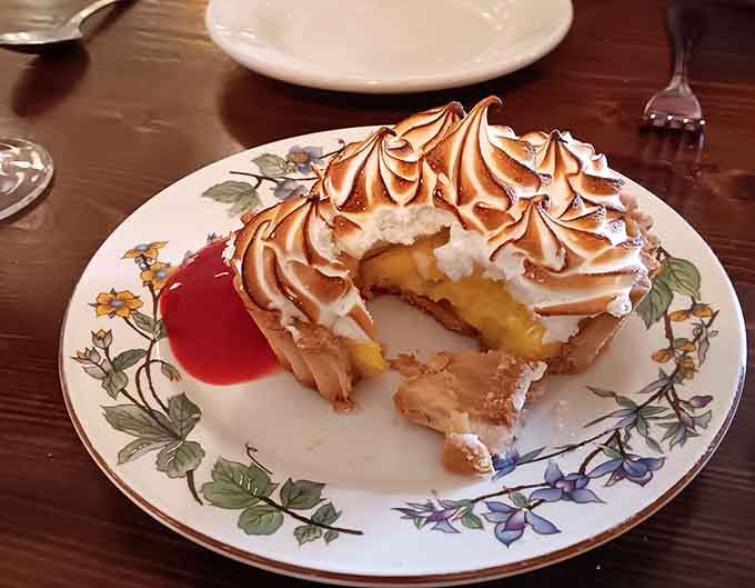 That golden meringue topping looks like it was kissed by a culinary angel with a blowtorch.