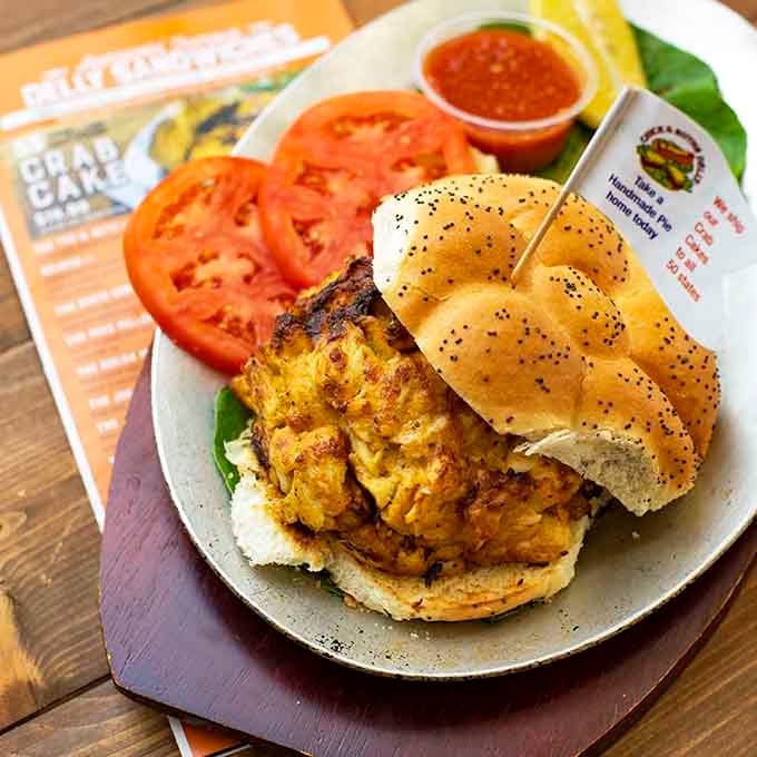 Maryland crab cakes on a poppy seed roll, because sometimes simplicity is the most delicious form of genius.