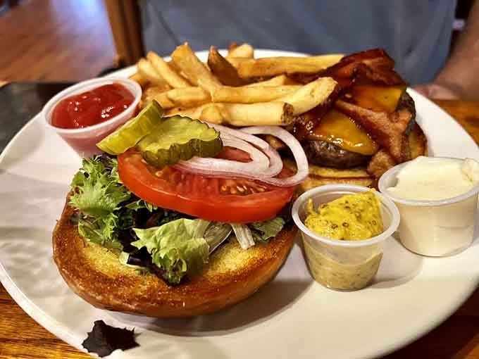 That bacon-topped burger with all the fixings looks like it's ready for its close-up and your immediate attention.