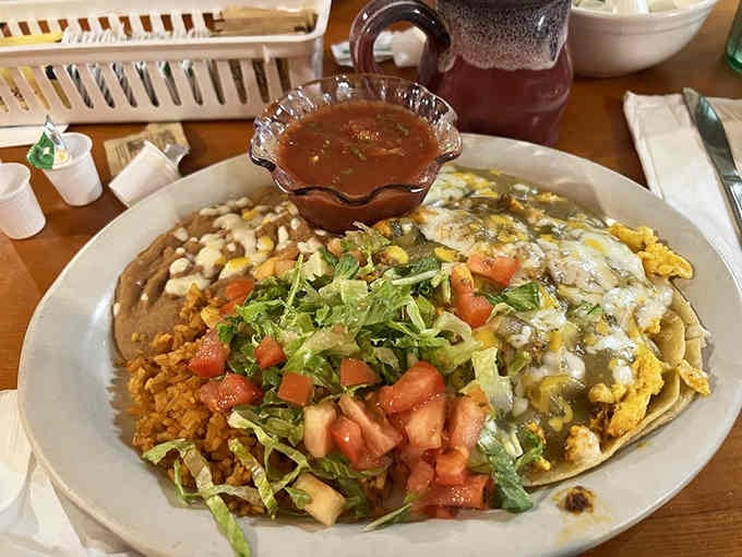 Huevos rancheros piled high with fresh toppings and enough flavor to wake up every taste bud you didn't know existed.