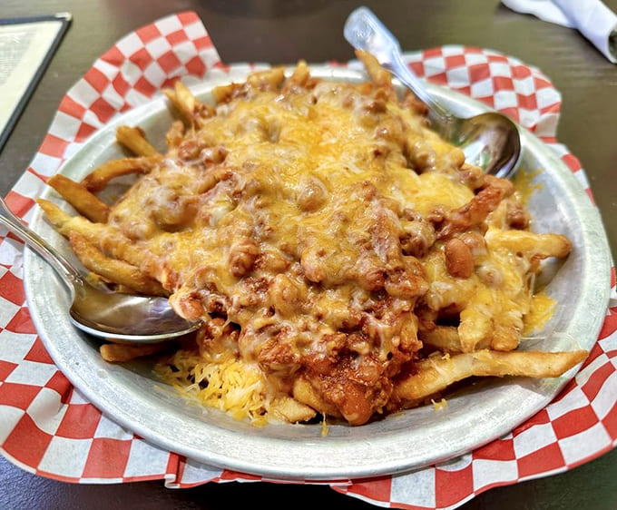 Chili cheese fries that don't apologize for anything, loaded with enough toppings to require architectural support and extra napkins.