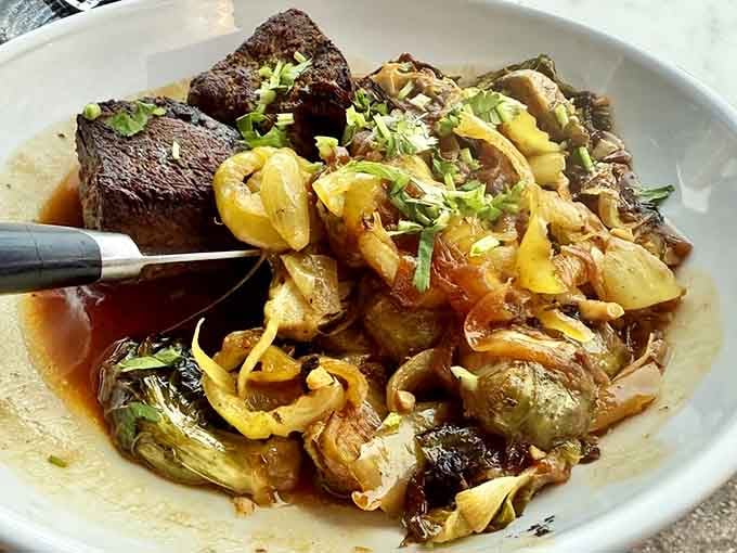 Italian braised beef so tender it practically dissolves on your fork, surrounded by vegetables that earned their spot on the plate.