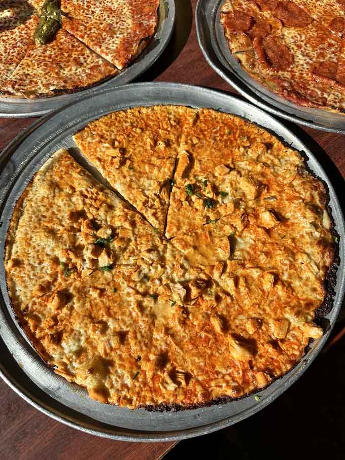 Buffalo chicken gets the bar pizza treatment, proving this thin crust can handle any topping combination imaginable.
