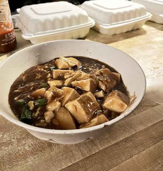 Tofu swimming in garlicky sauce that could convert even the most dedicated carnivore to the vegetable side.