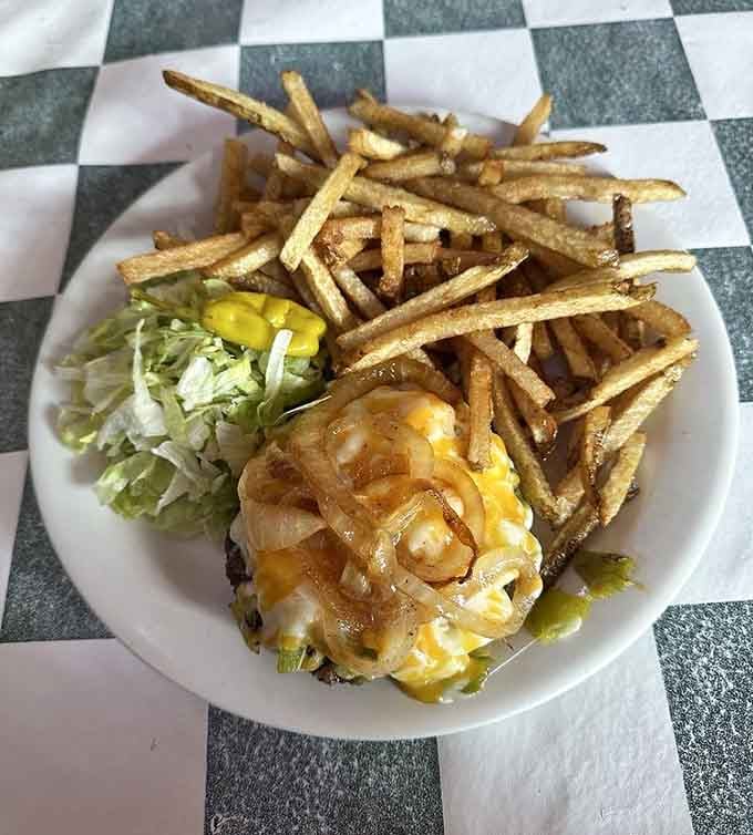 That green chili cheeseburger sits there like a delicious challenge, daring you to take the first magnificent bite.
