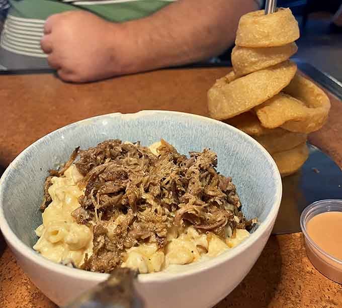 Pulled pork meets lobster mac and cheese in a fusion that shouldn't work but absolutely does.