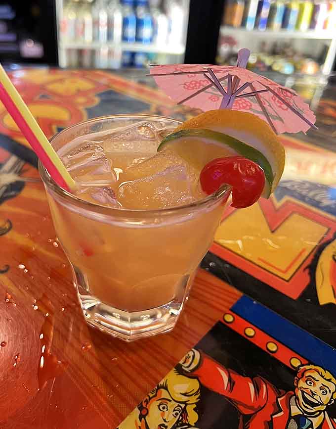 Tropical vibes meet retro gaming as this Mai Tai waits patiently between rounds of saving the galaxy.