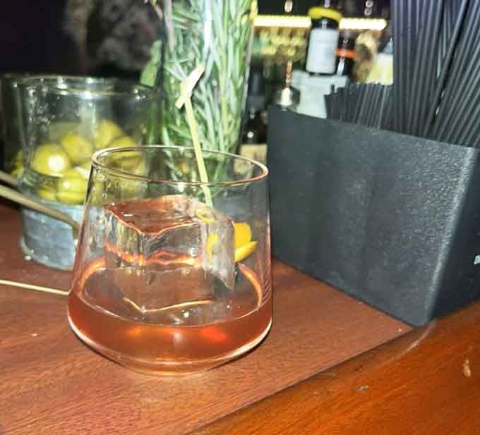 The swirl of a perfectly stirred cocktail catches the light like liquid amber, smooth and sophisticated in every sip.