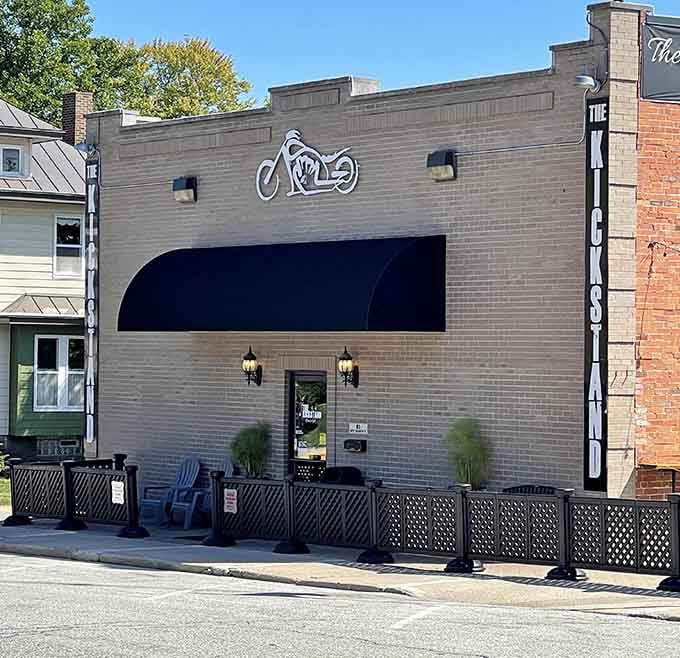 That motorcycle silhouette signals good times ahead, where comfort food meets casual atmosphere in perfect harmony for hungry travelers.