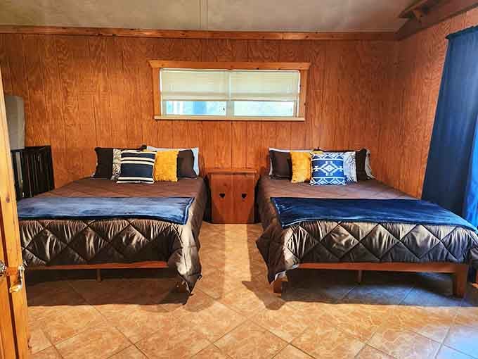 Twin beds in a wood-paneled room that channels summer camp, minus the questionable cafeteria food and mosquitoes.