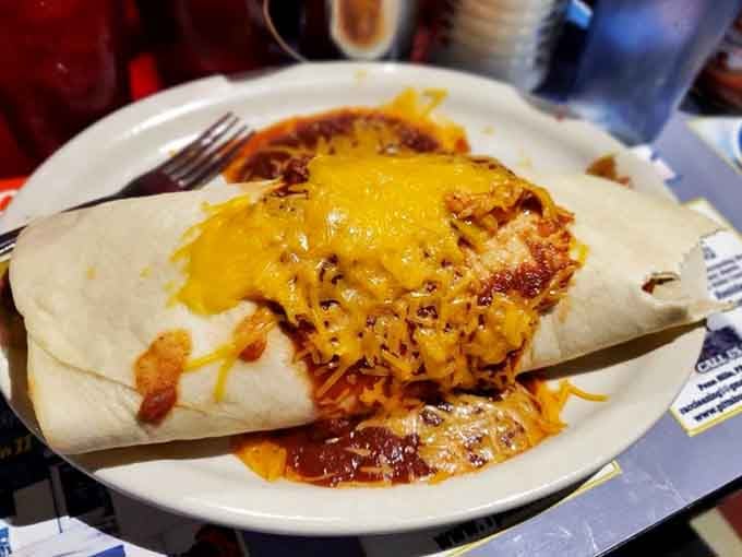 This breakfast burrito is wrapped tighter than a secret and loaded with more cheese than common sense.