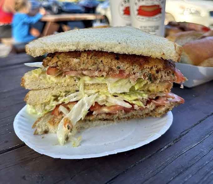 The crab cake sandwich that makes you forget you're eating at a picnic table instead of a yacht.