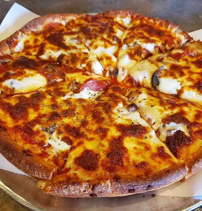 That cheese pull could win Olympic medals, stretching from plate to mouth in glorious, melted perfection.