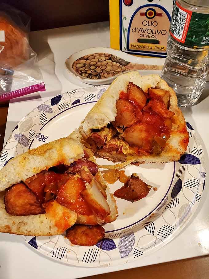 Italian sausage nestled in fresh bread with peppers and onions, because some combinations are simply meant to be.