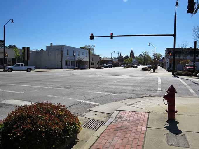 Wide streets and clear skies remind you that small-town life includes luxuries like actually seeing the horizon.