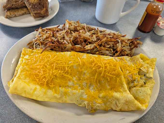 That omelet isn't messing around with portion sizes, and your appetite will thank them for it.