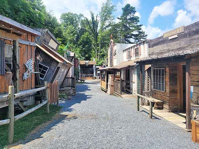 The weathered Old West storefronts create an authentic backdrop for the park's delightfully inauthentic historical mashup.