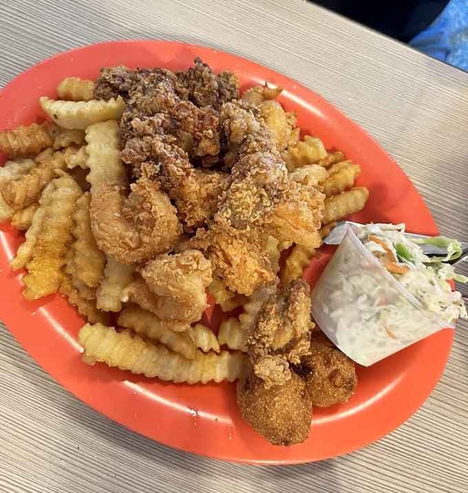 Fried shrimp and oysters piled high with hush puppies means someone in the kitchen really likes you today.