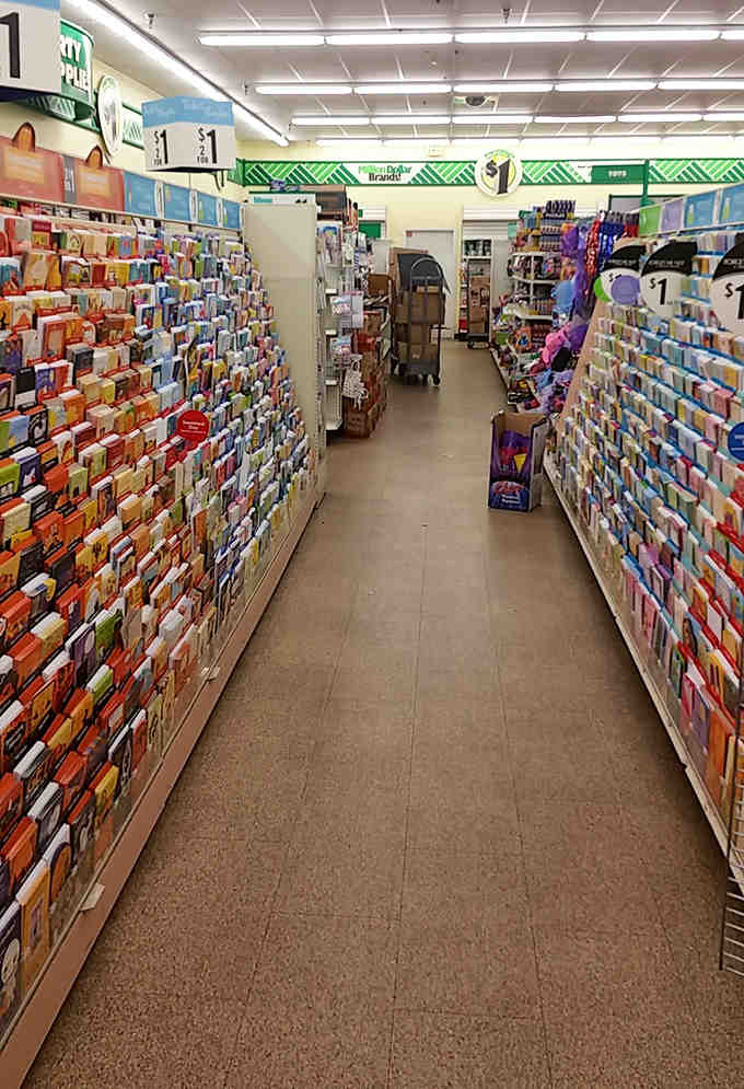 The greeting card aisle extends endlessly, offering heartfelt sentiments without the guilt of overspending on folded paper.