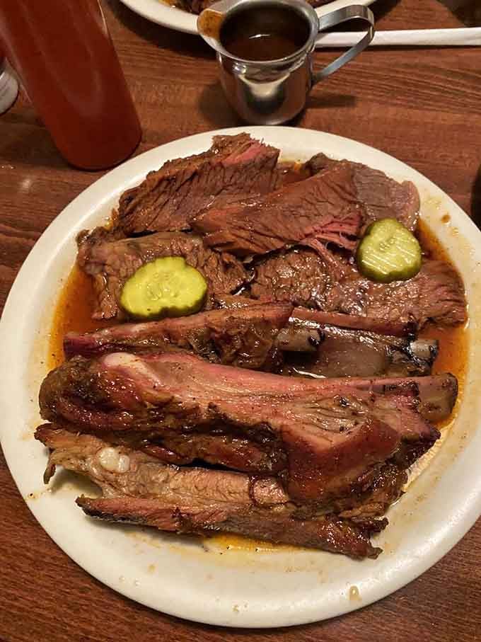 The ultimate power couple: perfectly smoked brisket and fall-off-the-bone ribs sharing one glorious plate together.