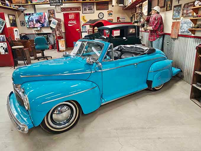 This convertible's paint job shines brighter than your optimism on a Friday afternoon before a long weekend.