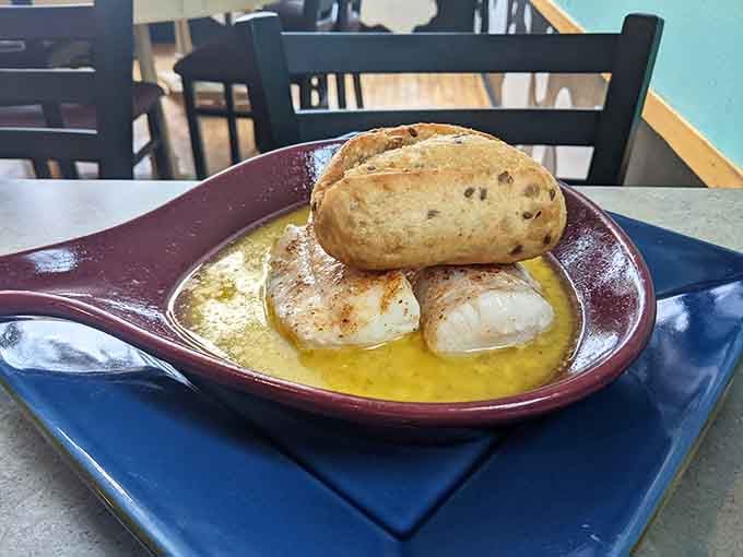 Broiled haddock swimming in butter sauce proves that not everything needs a deep fryer to achieve perfection.