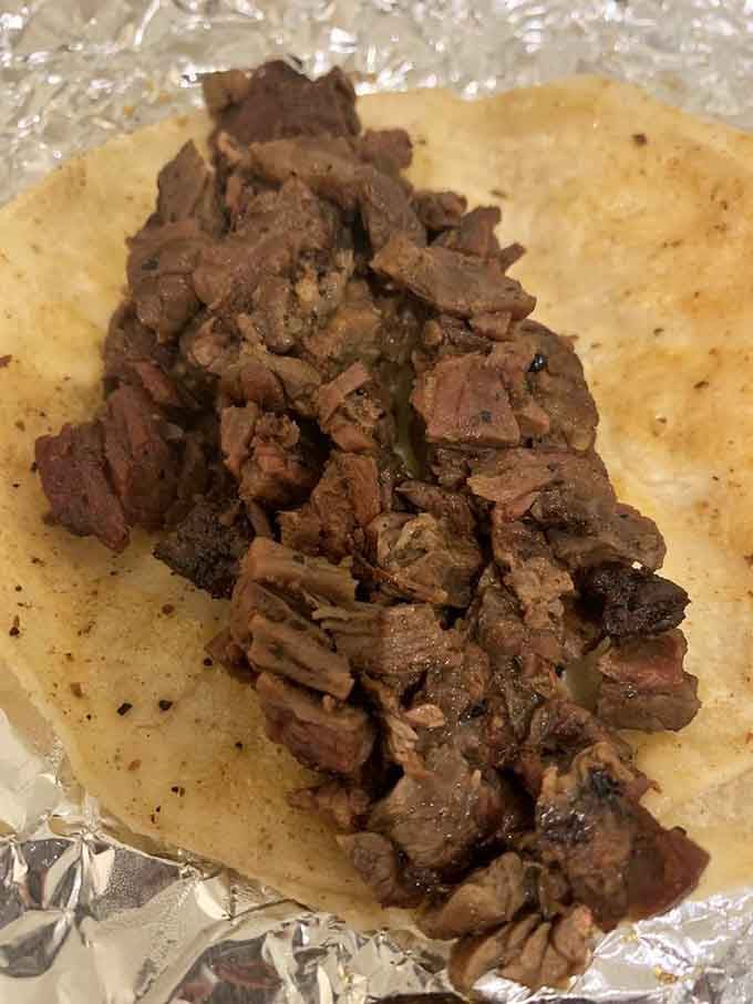 Lengua so tender it practically melts, proving adventurous eaters always get the best rewards in life.