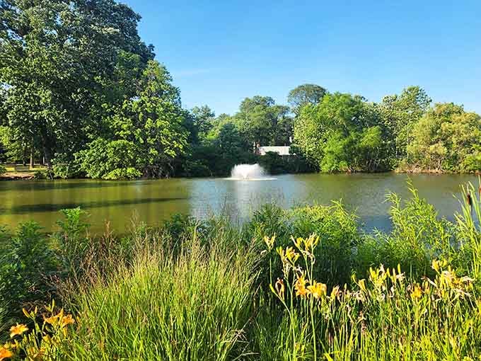 The peaceful pond with its fountain creates the perfect soundtrack for contemplative garden wandering.