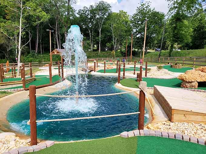 Crystal-clear water pools and dramatic fountains create a cooling oasis that makes Alabama heat suddenly feel manageable.