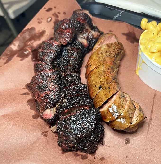 Ribs and sausage on butcher paper: the kind of presentation that says we're serious about meat, not Instagram likes.
