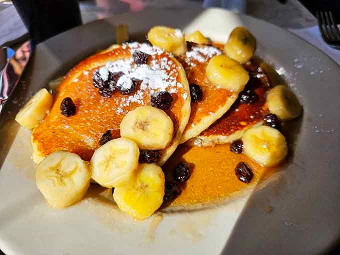 Pancakes topped with bananas and chocolate chips&mdash;breakfast never looked so ready for its close-up or your Instagram feed.