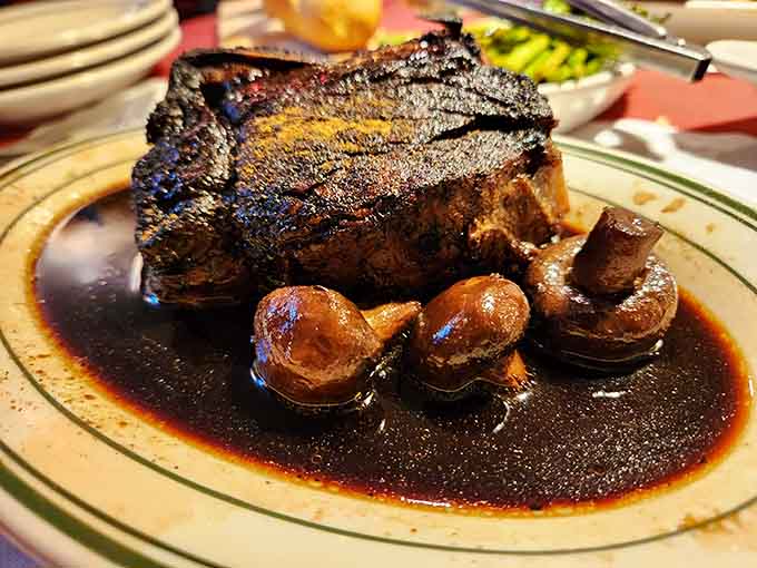 A filet mignon with mushrooms and asparagus, proving that simple preparations let quality beef shine brightest of all.